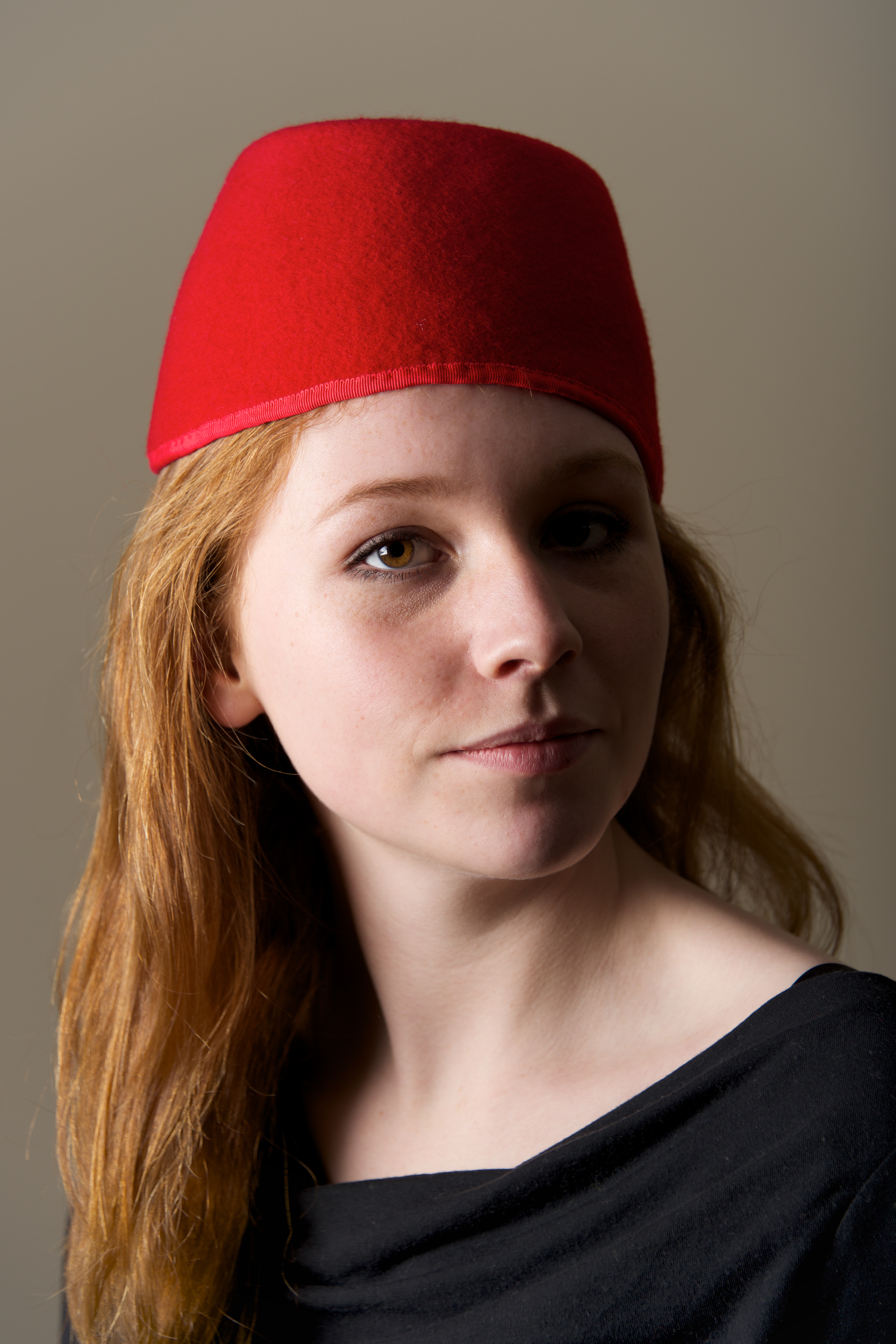 Serious redhead in red felt Moroccan fez - Nick Dale - Private Tutor