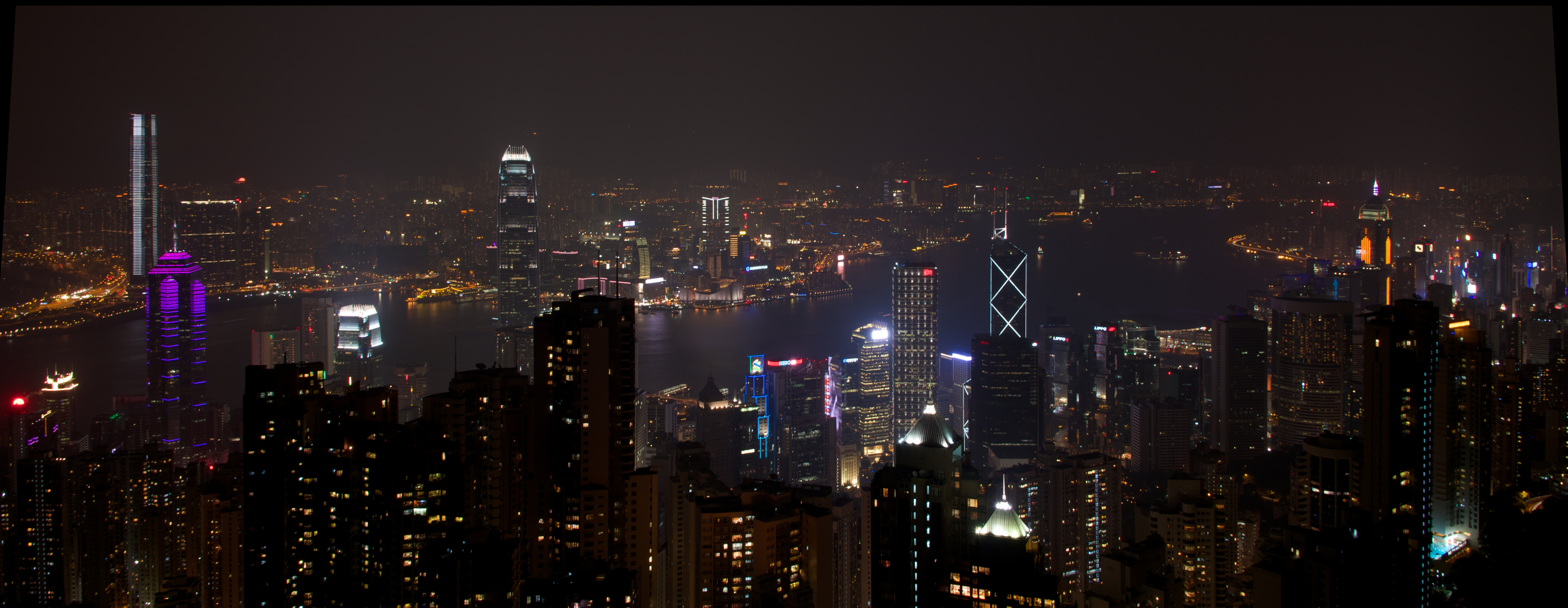 Victoria Harbour panorama lit up at night | Nick Dale – Private Tutor
