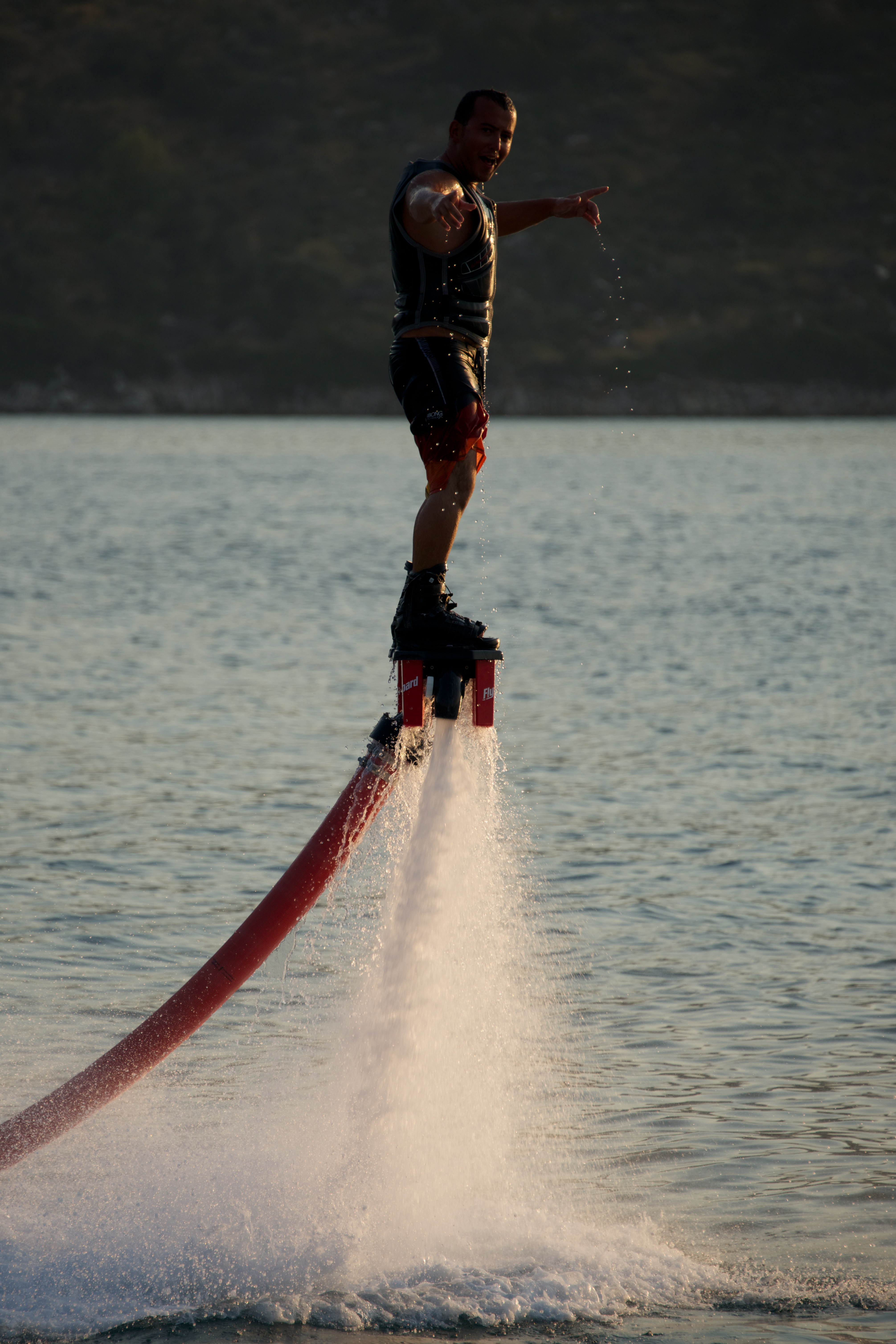 Flyboarder with arms out looking towards camera | Nick Dale – Private Tutor